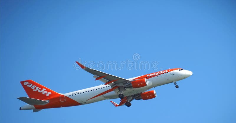 EasyJet Airplane Flying at Blue Sky Editorial Stock Photo - Image of ...