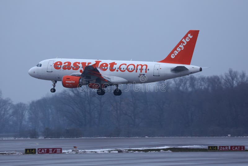 Easyjet plane taking off editorial image. Image of chain - 134432825