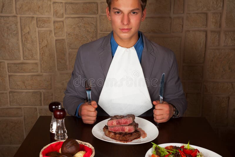 Eat a beef steak stock image. Image of carnivore, dinner - 32293305