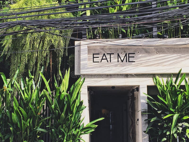 EAT ME Sign Front Gate of Garden Style Cafe and Restaurant Stock Image ...