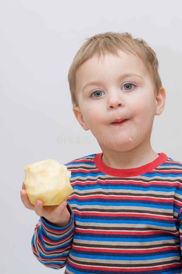 Eating apple stock image. Image of babies, apple, innocent - 12946209