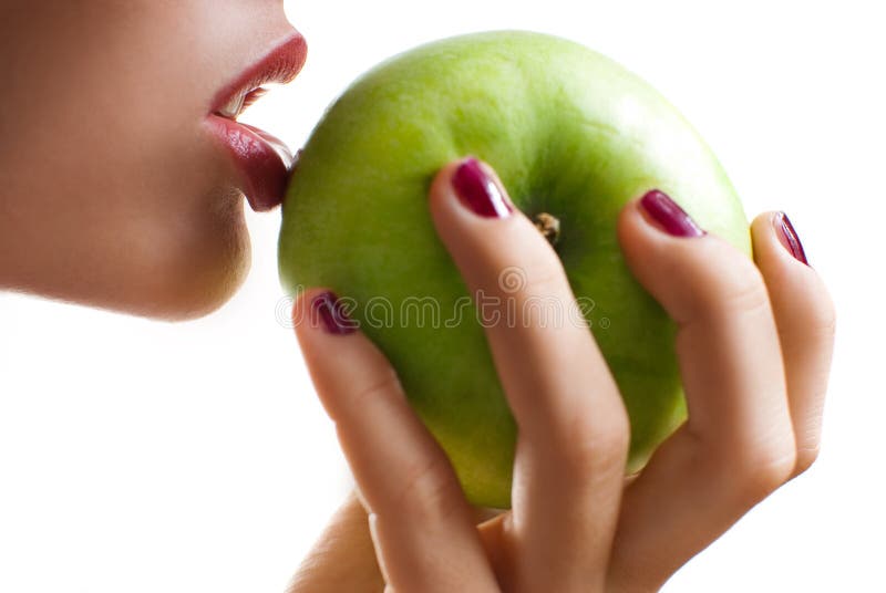 Eating an apple stock photo. Image of caucasian, lipstick - 35297668