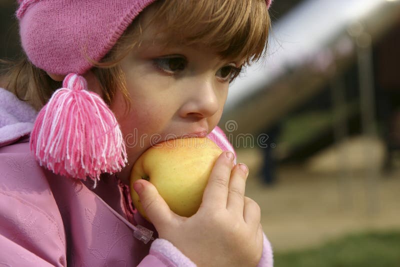 Eating apples stock image. Image of outdoors, fruits, bite - 1578817
