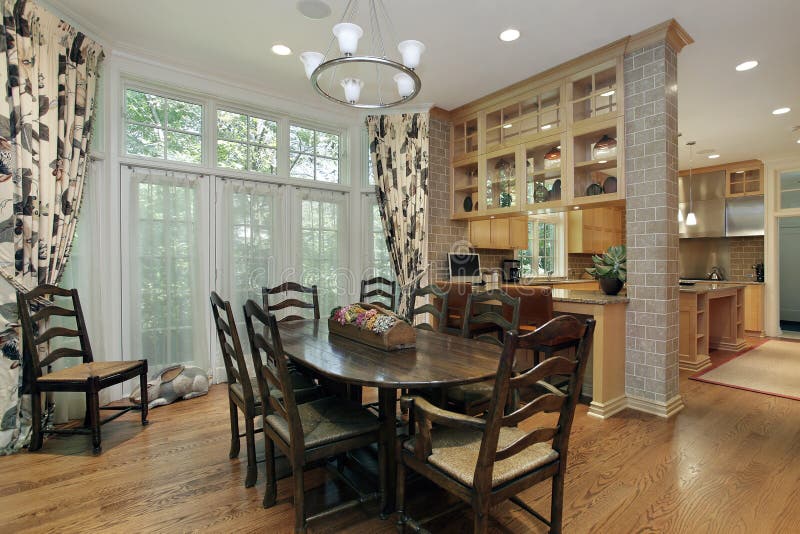 Kitchen with View into Sunroom Stock Image - Image of furniture, decor ...