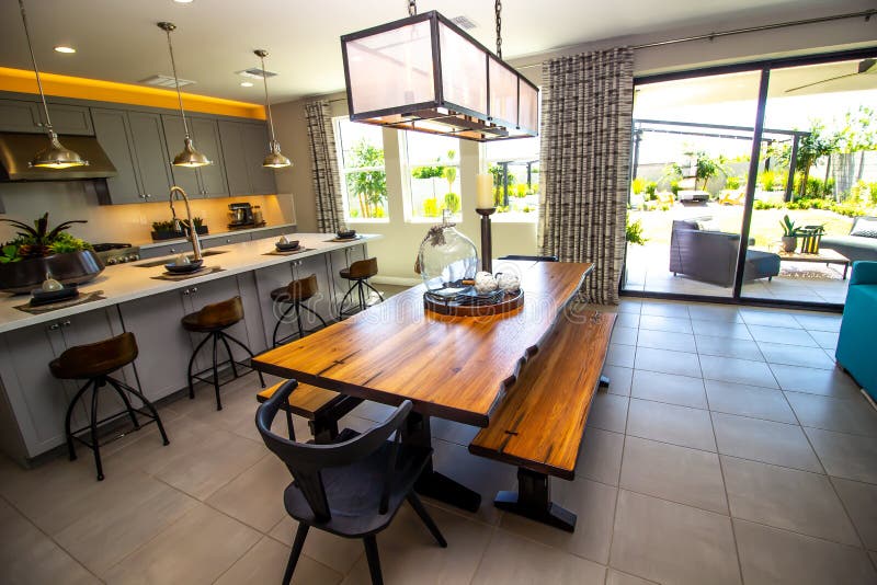 Eating Area Rich Wood Table with Benches and Multi Light Chandelier ...