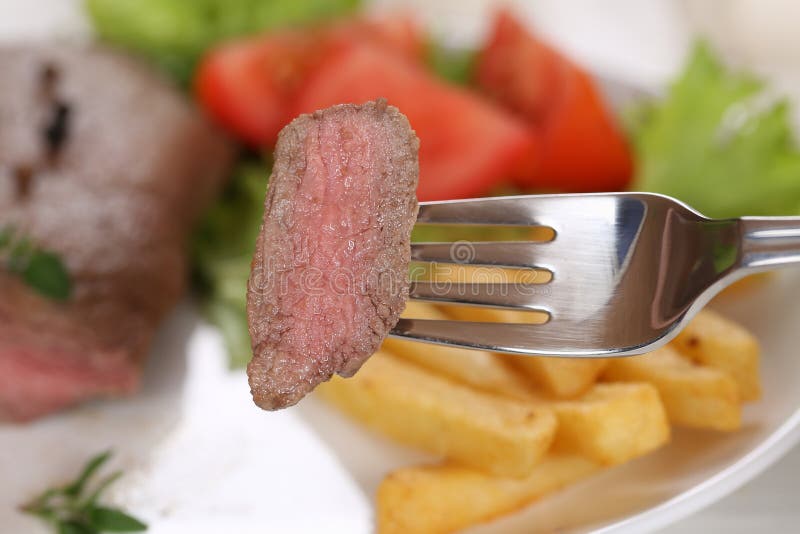Eating Beef Steak Meat with Fork Stock Image - Image of dinner, eating ...
