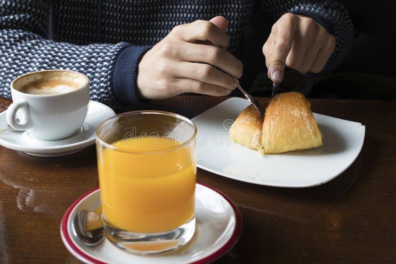 Eating breakfast coffee stock photo. Image of hands - 105764638