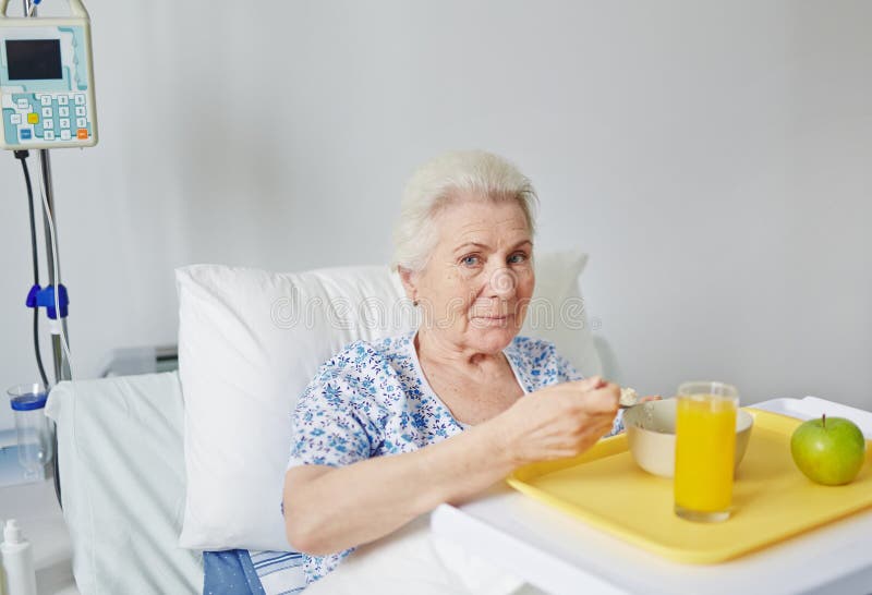 Eating breakfast stock photo. Image of clinic, elderly - 78319072