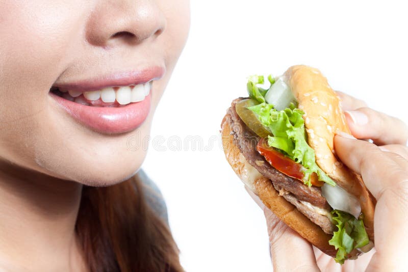Eating Burger stock image. Image of asian, hungry, holding - 25913875