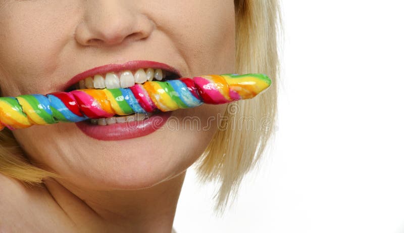 Eating candy stock photo. Image of vibrant, blond, face - 14816674