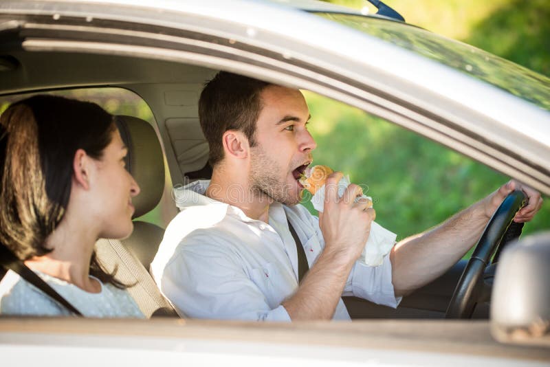 Eating in car stock image. Image of caucasian, person - 64730929