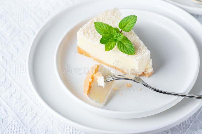 Eating Cheesecake. Taking Bite of Cheesecake with Fork Stock Photo ...
