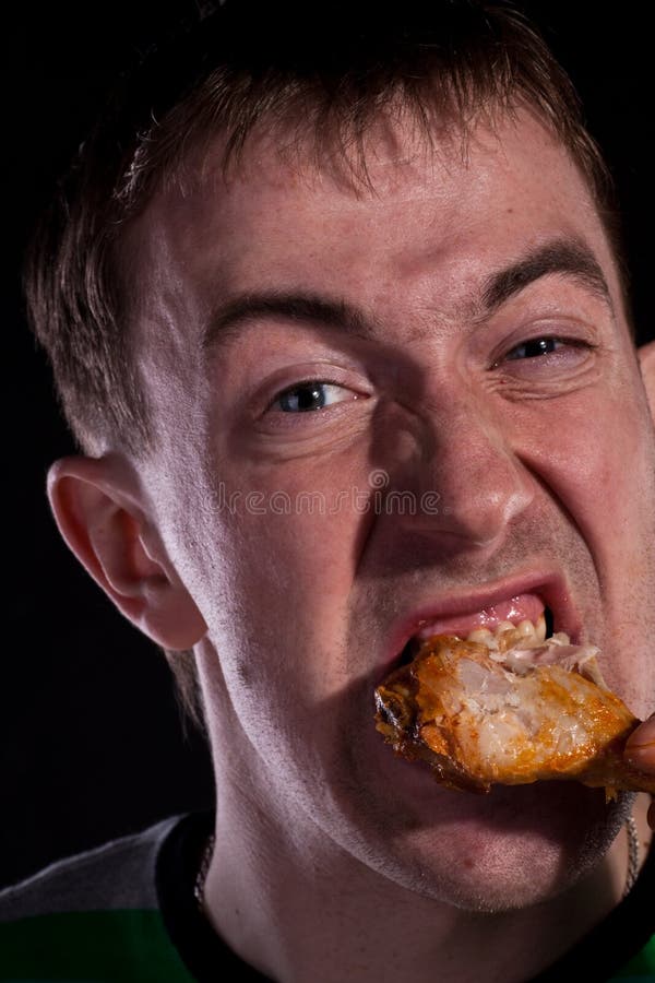 Eating chicken stock photo. Image of hunger, juicy, face - 12640244
