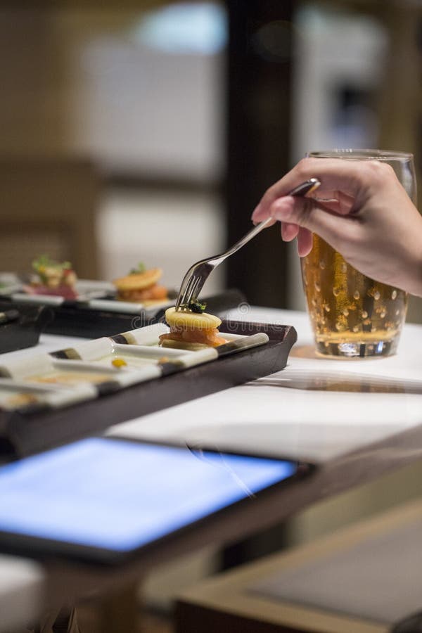 Eating Cocktail Food with Fork Stock Photo - Image of nails, fish: 45328496