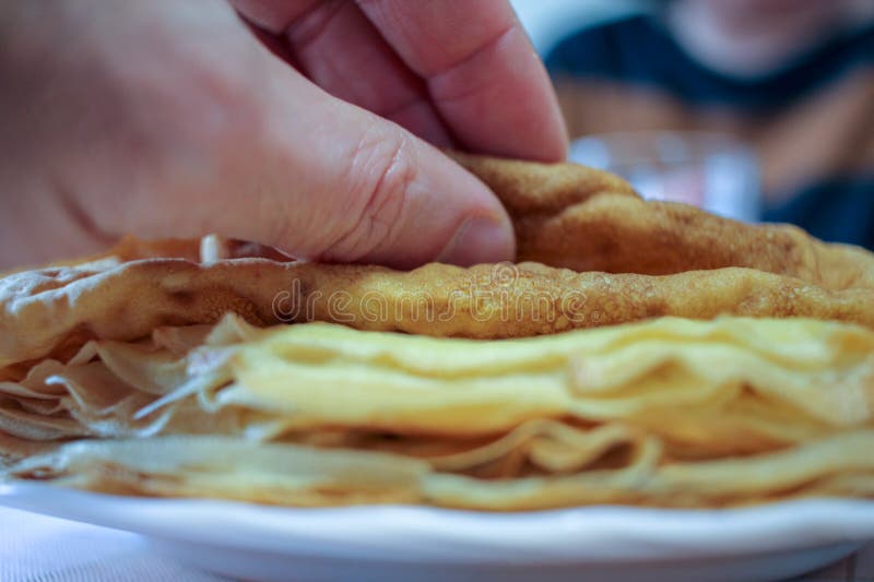 Eating crepes with my hand stock image. Image of lunch - 377055159
