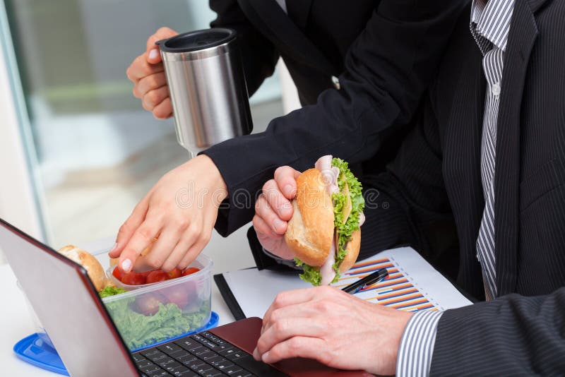 Eating at the desk stock image. Image of computer, laptop - 38975345