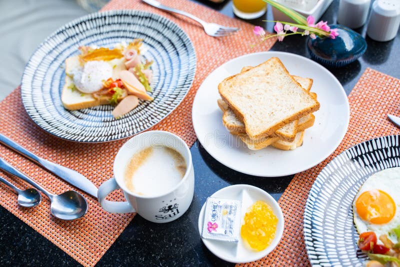 Eating Egg and Toast in Breakfast at Restaurant Stock Image - Image of ...