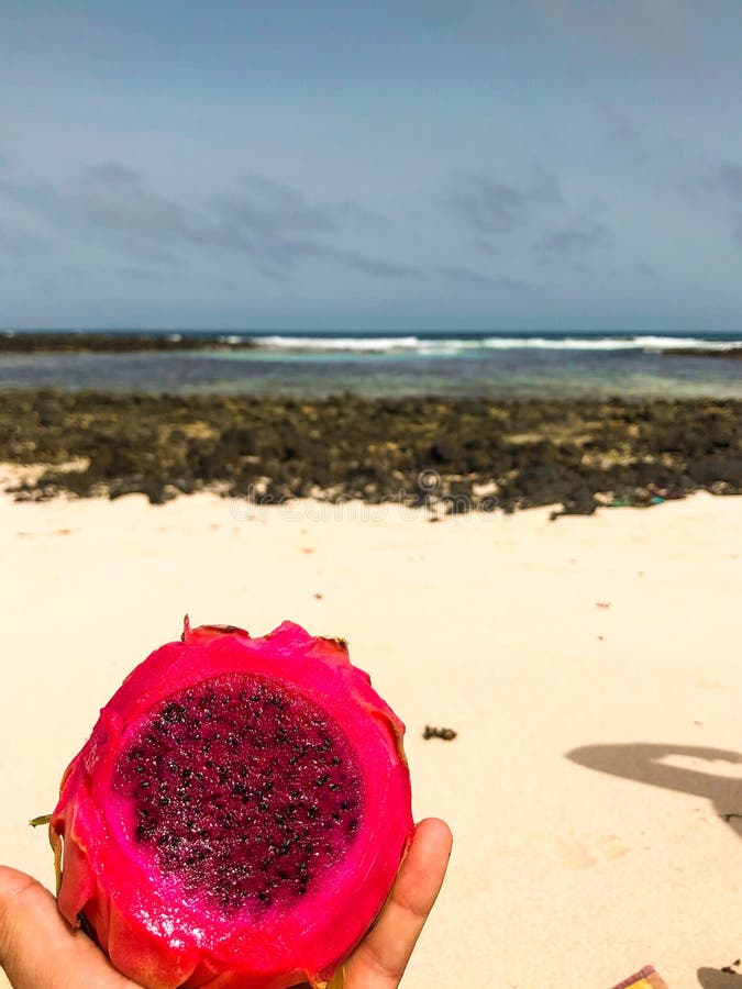 Eating an Exotic Fruit at the Beach Stock Photo - Image of summer ...