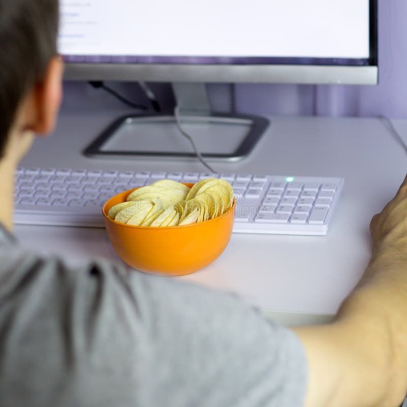 Woman Works at the Computer and Eating Fast Food. Unhealthy Life Stock ...