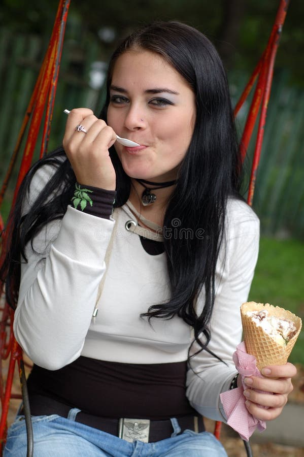 Woman eating ice-cream stock photo. Image of relaxed, cheerful - 3176632