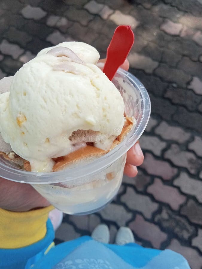 Eating Ice Cream Together with the Hot Sun is Very Delicious Stock ...