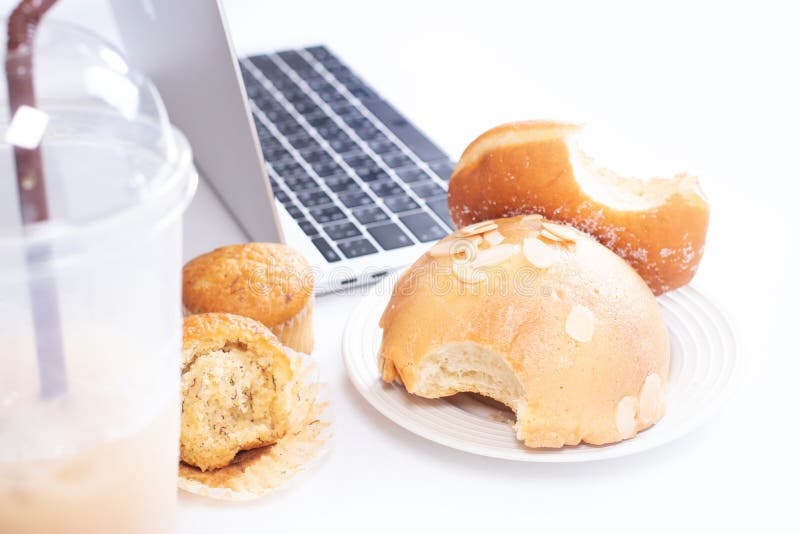 Food and Sweet Bread on the Computer Desk. Stock Photo - Image of bread ...