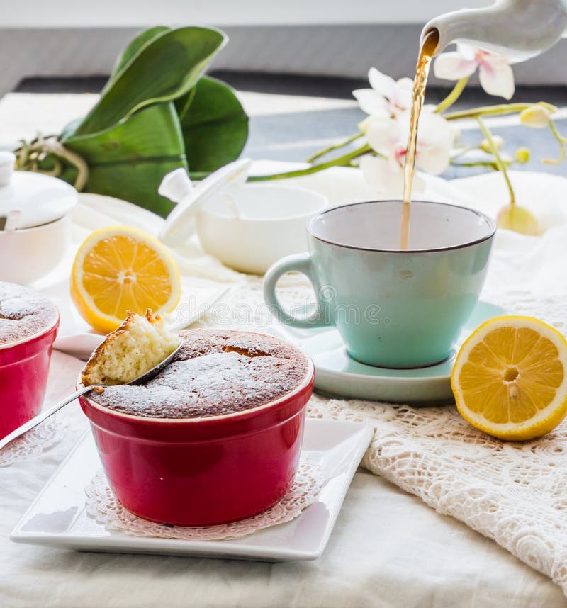 Eating Lemon Pudding with Red Plates, English Tea Party Stock Image ...