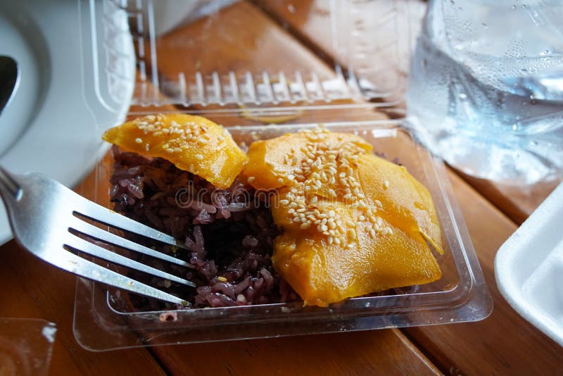Eating Mango and Black Sticky Rice with a Fork Stock Photo - Image of ...