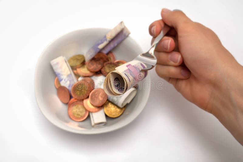 Eating Money stock photo. Image of coin, coinage, devour - 15569232