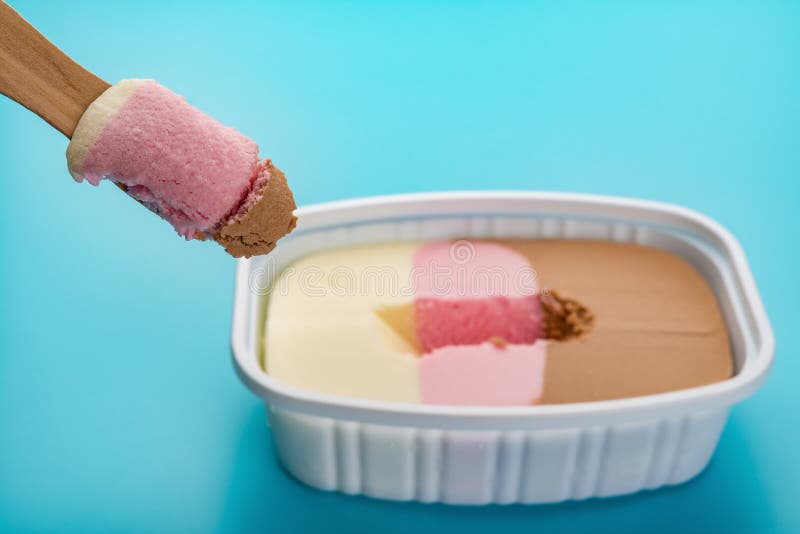 Eating Multi-color Ice Cream Stock Image - Image of crispy, blue: 95596223