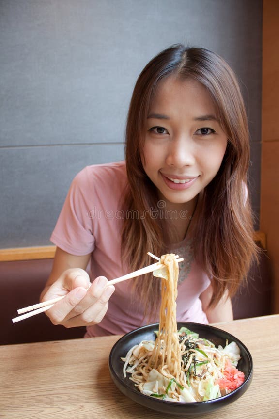 Eating Noodle stock image. Image of beautiful, hair, female - 21875313