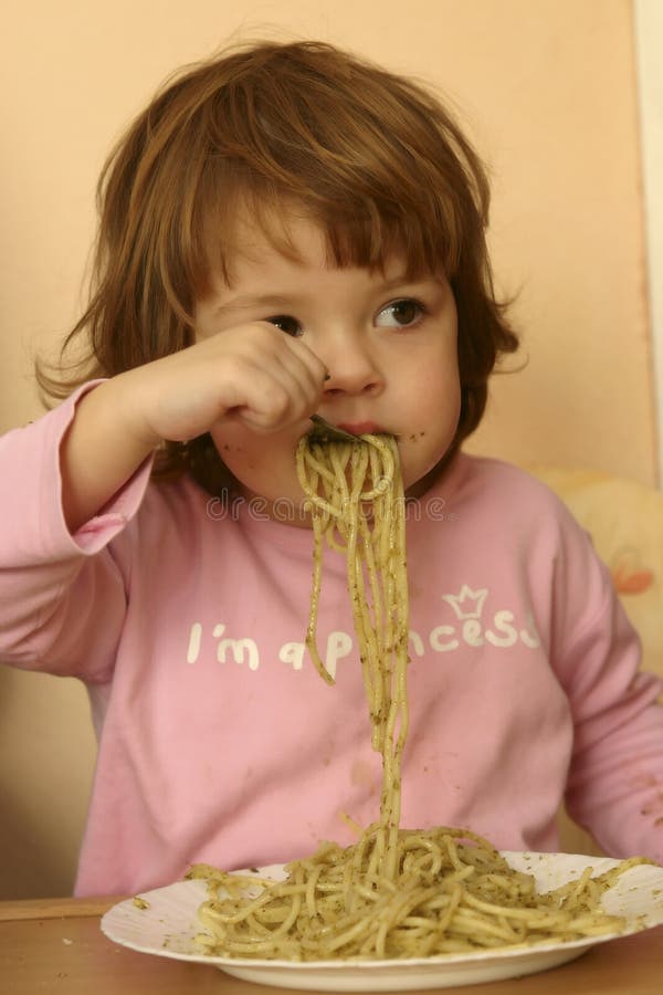 Eating pasta stock image. Image of dinner, girls, plate - 1796557