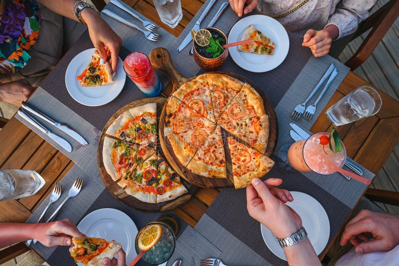 Eating Pizza in a Restaurant, View of the Table from Above, Pieces of ...