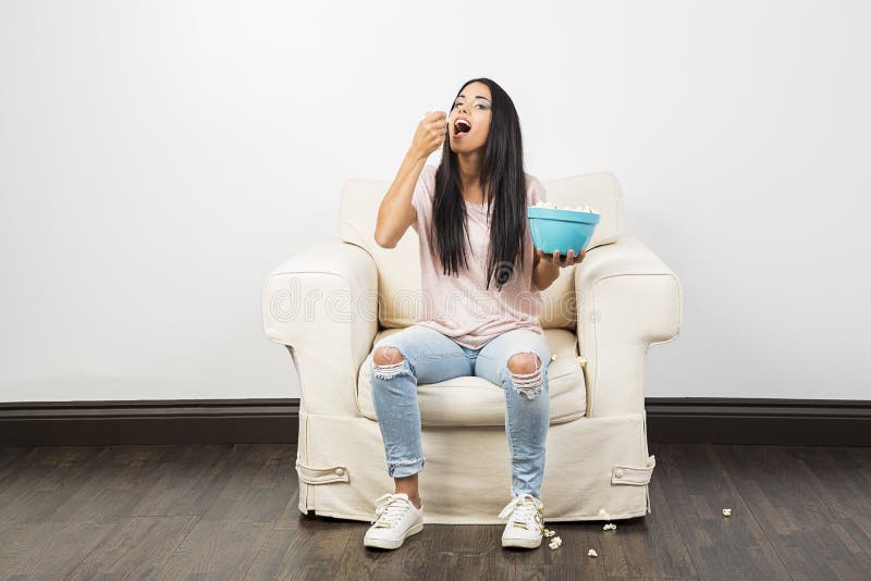 Eating popcorn stock photo. Image of female, person - 160843626