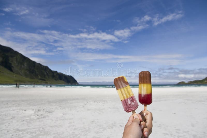 Eating Popsicles at the Beach Stock Photo - Image of mountains, scenic ...