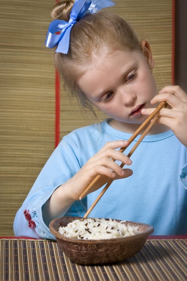 Eating rice stock image. Image of healthy, blond, cereal - 5783929