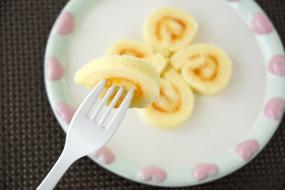 Eating sponge cake stock photo. Image of grass, cream - 36836748