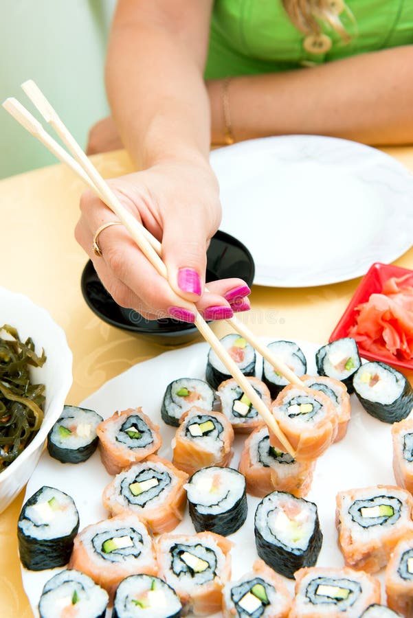 Eating Sushi stock photo. Image of gourmet, rice, dinner - 24752540