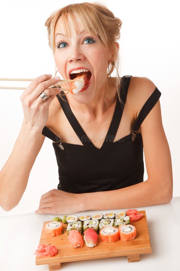 Eating sushi stock photo. Image of fashion, black, caucasian - 28218098