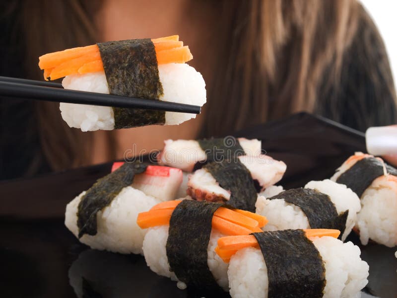 Eating sushi stock image. Image of studio, shot, focus - 48845379