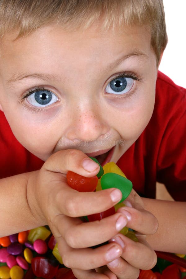 Eating Sweets stock image. Image of casual, handful, tasty - 14400647