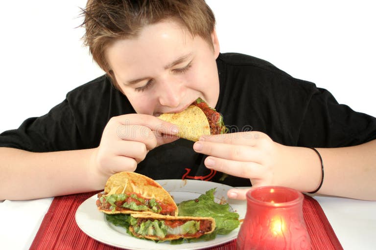 Eating tacos stock image. Image of meat, flavor, male - 1457305