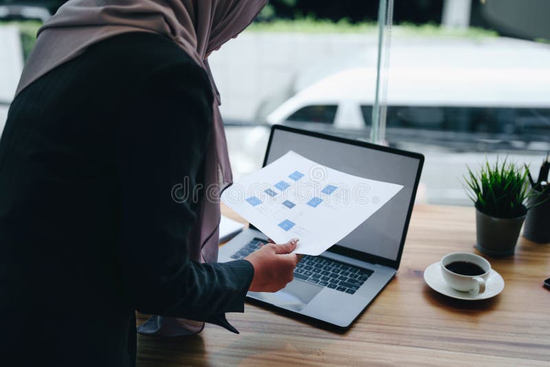 Eautiful Muslim Woman Using Computer and Documents Working in Office ...
