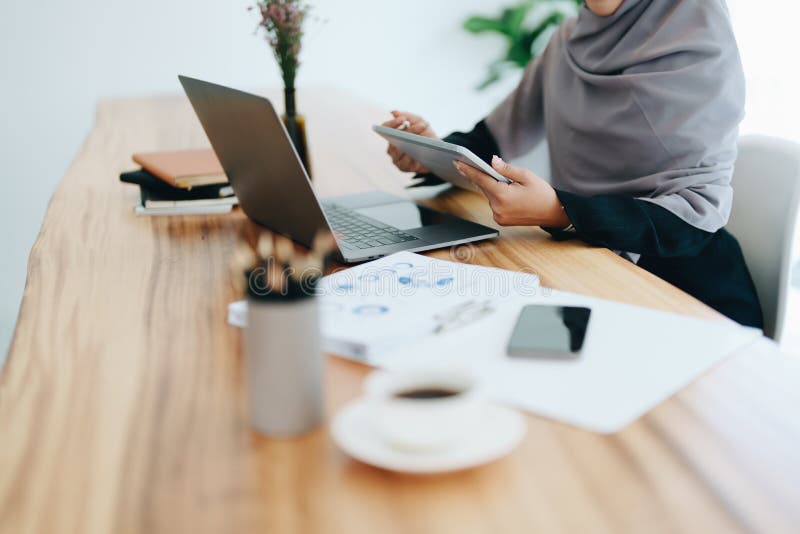 Eautiful Muslim Woman Using Computer and Documents Working in Office ...
