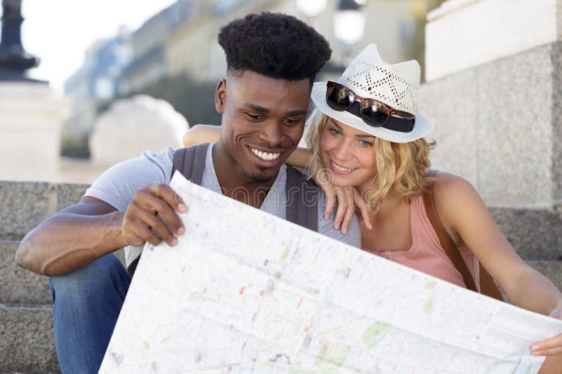 Happy Tourist Couple in Love with Map Traveling Outdoors Stock Image ...