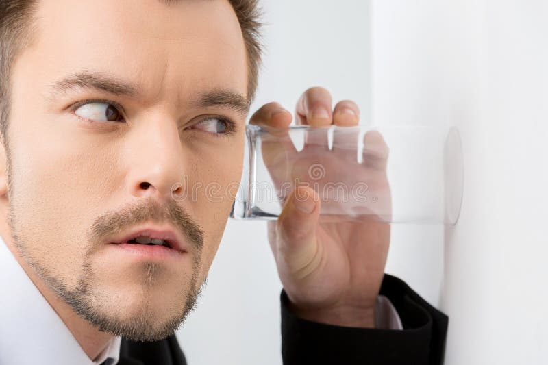 Eavesdropping. stock photo. Image of young, male, beard - 33721426