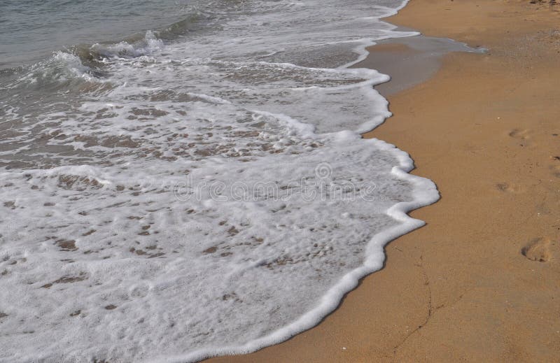 Ebb and flow by the sea stock photo. Image of coast - 104119762