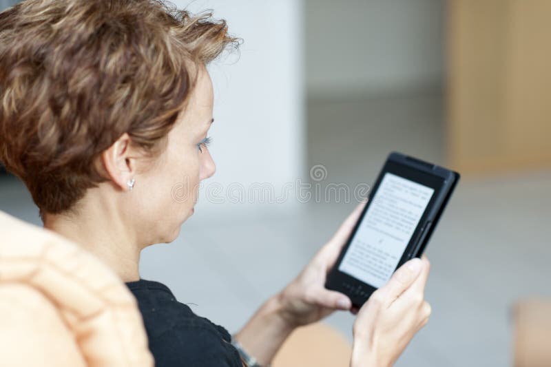 Young Woman Reading on EBook Stock Photo - Image of elearning ... Young Woman Reading on EBook Stock Photo - Image of elearning ...