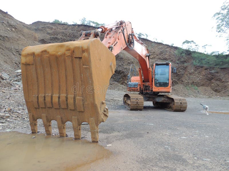 Ecavator mining machine stock photo. Image of rocks, work - 72989204