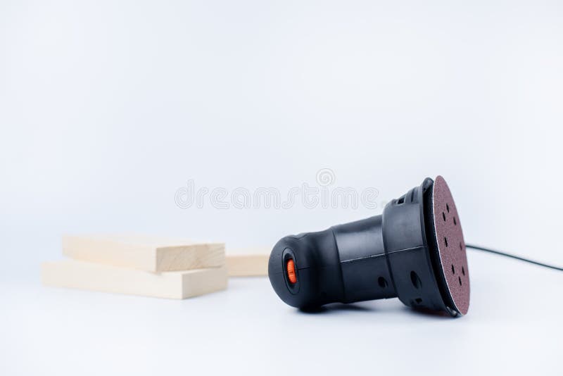 Eccentric Grinding Machine. Power Tool. on a White Background. Bars of ...